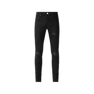 Amiri MX1 Distressed Skinny Jeans