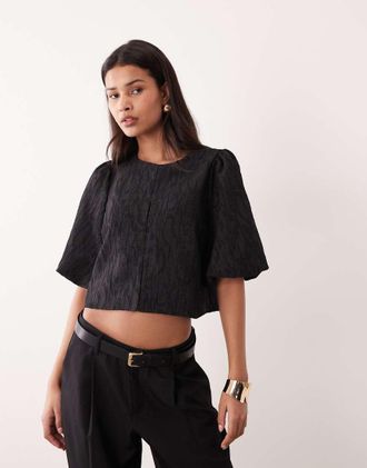 Vero Moda Top en jacquard structur&eacute; &agrave; manches bouffantes - Noir
