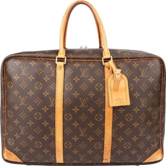 Louis Vuitton Crossbody Bags - Louis Vuitton Canvas Monogram Sirius Travel Bag - Gr. unisize - in Braun - für Damen