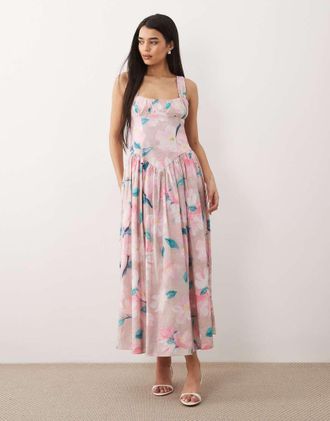 Bardot Cartia - Robe longue tendance folk en coton imprim&eacute; fleuri avec taille corset et liens nou&eacute;s au dos - Rose