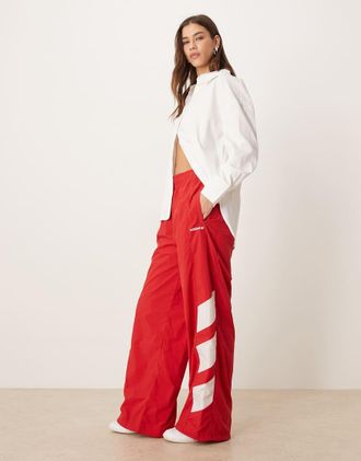 adidas Originals Pantalon de surv&ecirc;tement color block - Rouge &eacute;carlate d&eacute;lav&eacute;
