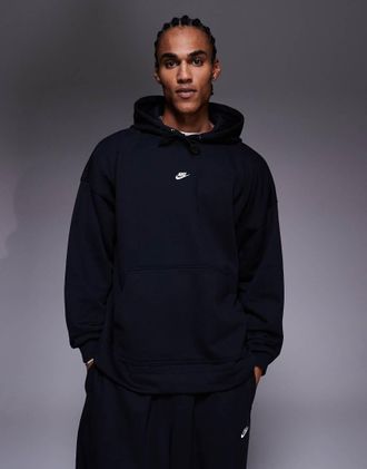Nike Club - Oversize-Kapuzenpullover aus French Terry in Schwarz