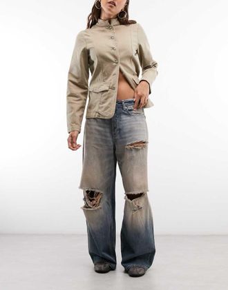 Weekday jeans baggy &agrave; taille basse, jambe large, avec d&eacute;tails us&eacute;s, bleu &agrave; reflets roses