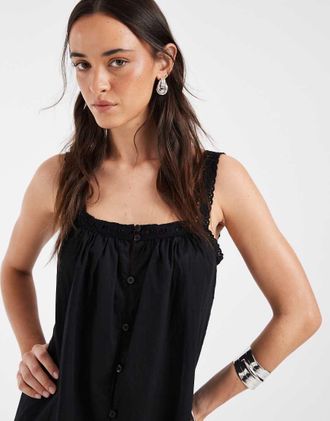 Motel Veraux - Maxikleid aus Popeline in Schwarz-Braun