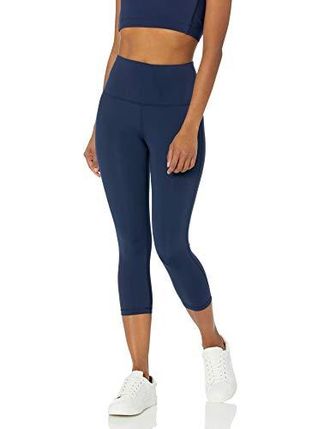 Amazon Essentials Legging de sport 7/8 à taille haute modelant (existe en grandes tailles) Femme, Bleu Marine, L