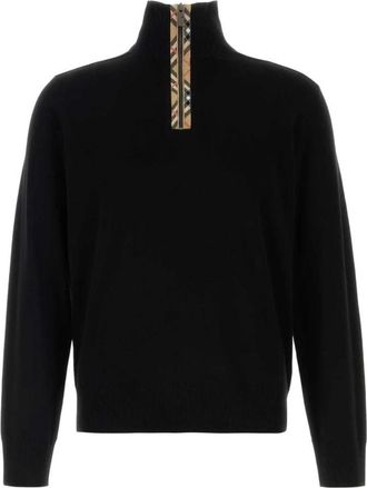 Burberry Pullover mit Karomuster-Besatz aus Wolle und halblangem Rei&szlig;verschluss - - Knitwear - Herren - Schwarzk - M