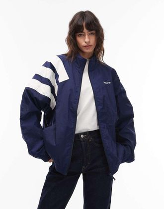 adidas Originals Arch - Haut de surv&ecirc;tement - Bleu marine/blanc cass&eacute;