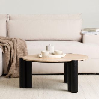 IDIMEX TAPTI Couchtisch mit Tischplatte aus Travertin 80 cm, Beige/Schwarz - Runder Wohnzimmertisch aus massivem Mangoholz, Coffee Table, Beistelltisch mit M
