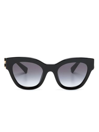 Miu Miu Eyewear lunettes de soleil &agrave; logo 01YS - Noir