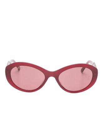 Balenciaga lunettes de soleil BB0446S &agrave; monture ovale - Rouge