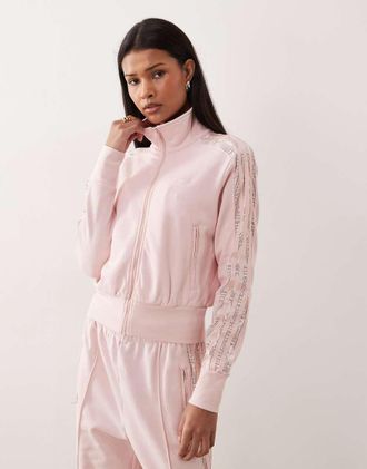 adidas Originals Firebird - Haut de surv&ecirc;tement &agrave; dentelle - Rose sable