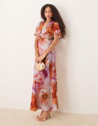 Asos Robe mi-longue satin&eacute;e avec d&eacute;coupe et d&eacute;tail nou&eacute; - Rose et orange fleuri-Multicolore