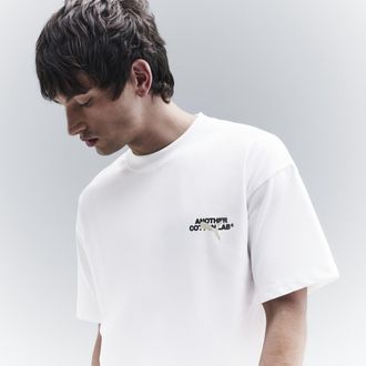 Puma T-shirt &agrave; logo Sunday Running Club PUMA x ANOTHER COTTON LAB Unisexe, V&ecirc;tements, Blanc, XL