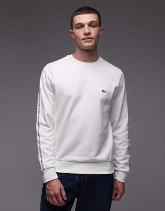 Lacoste Sweatshirt in Wei&szlig; mit Logostreifen und Rundhalsausschnitt