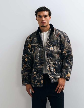 Carhartt Work in Progress manteau Lander &agrave; imprim&eacute; camouflage arbre fonc&eacute;-Multi
