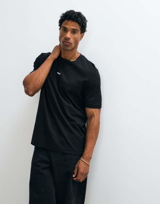 Boss Orange by Hugo Boss HUGO BOSS - T-shirt d&eacute;contract&eacute; &agrave; petit imprim&eacute; - Noir