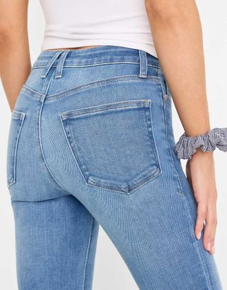 Good American Jean bootcut taille haute en tissu technique doux - Bleu moyen d&eacute;lav&eacute;