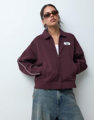 Lacoste Tennis Heritage Badge-Detail Stretch-Piqu&eacute;-Sweatshirt mit Rei&szlig;verschluss in Burgunderrot
