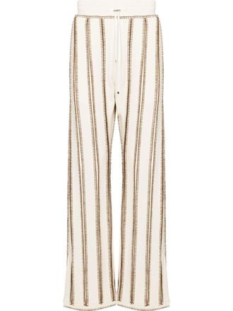 Amiri pantalon de jogging &eacute;vas&eacute; &agrave; rayures - Tons neutres