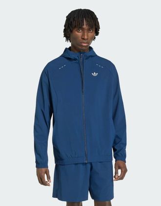 adidas Originals Tech Trefoil Essentials Kapuzen-Tracktop mit durchgehendem Rei&szlig;verschluss in Nachtindigo-Blau