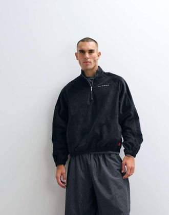 Nike Jordan veste en velours c&ocirc;tel&eacute; noire &agrave; logo et demi-zip