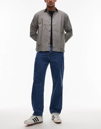 Levi's 568 - Locker sitzende, leichte Straight Jeans aus Baumwoll-Leinenmix in Mittelblau
