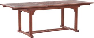 Beliani Gartentisch Akazienholz Dunkelbraun ausziehbar rechteckig 160/220x90 cm mit Schirmloch Toscana