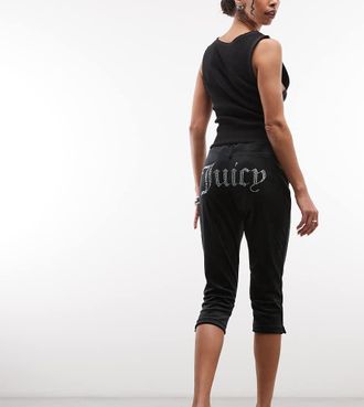 Juicy Couture Exklusive Velours-Caprihose in Schwarz mit Strasslogo