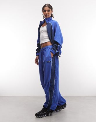 Collusion xl baggy Panel-Nylon-Jogger in Blau und Marineblau