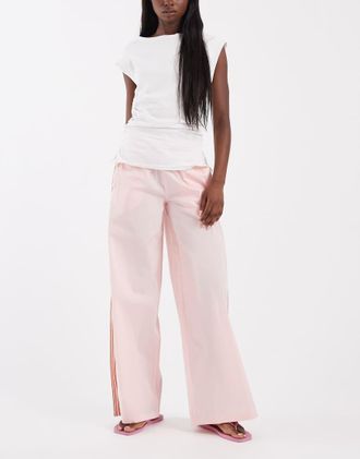 adidas Originals Pantalon de surv&ecirc;tement &agrave; 3 bandes au crochet - Rose clair