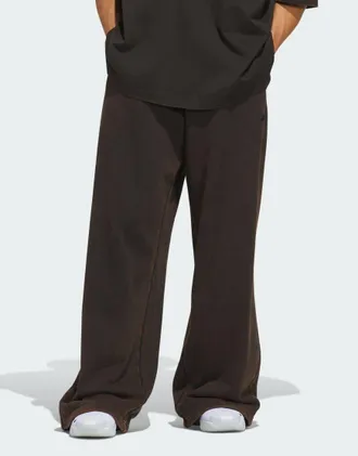 adidas Pantalon de basketball ample en polaire effet d&eacute;lav&eacute; - Noir