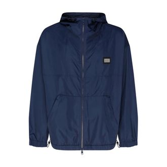 Dolce & Gabbana Nylonjacke mit Kapuze und Markenetikett - - Jackets - Herren - Blau - XS