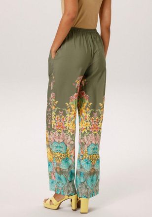 Aniston Schlupfhose mit farbenfrohen Blumendruck
