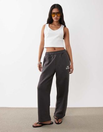 New Balance Trackside - Pantalon de jogging ample en polaire - Noir