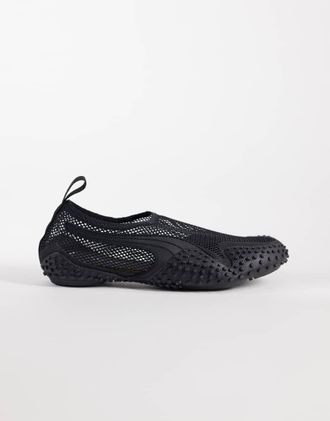 Puma Mostro Flex - Netzstoff-Sneaker in Schwarz