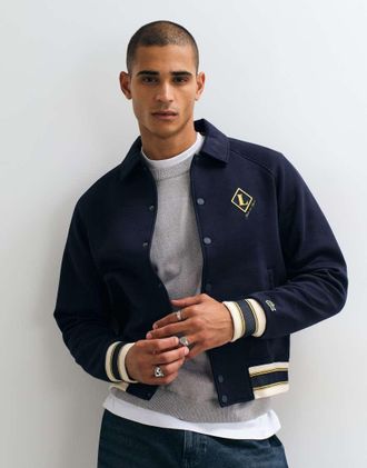 Lacoste bomber &agrave; badge bleu marine