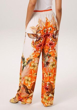 Aniston Schlupfhose mit tropischen V&ouml;geln, Bl&uuml;ten und Bl&auml;ttern bedruckt - NEUE KOLLEKTION