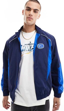 Nike Air - Top de survêtement tissé à logo virgule - Bleu marine et bleu