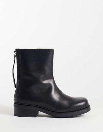 Vagabond Karlie bottines plates avec doublure chaude en cuir noir