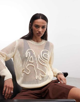 AllSaints Raelyn - Pull en maille &agrave; logo - Blanc cass&eacute;