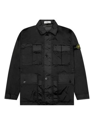 Stone Island veste matelassée à patch Compass - Noir