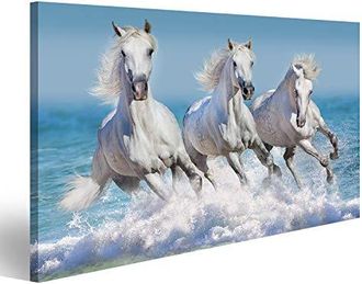 Islandburner Tableau Tableaux sur toile Des chevaux au galop dans les vagues de loc&eacute;an UJR