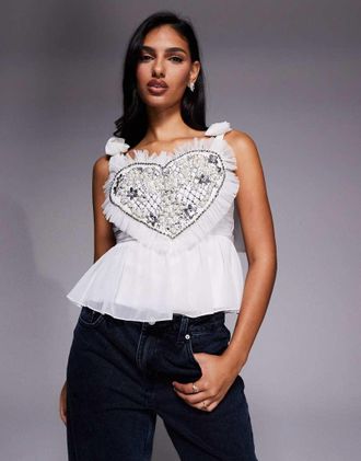 Asos Top &agrave; basque avec coeurs ornement&eacute;s et noeuds sur les &eacute;paules - Blanc