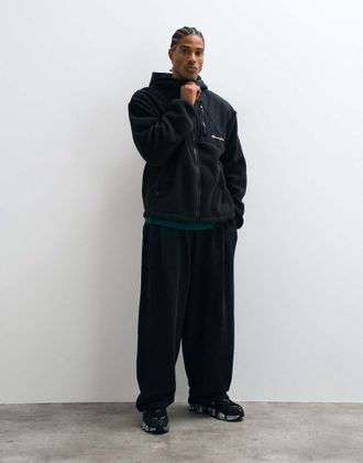 Champion Polar Kapuzenoberteil mit durchgehendem Rei&szlig;verschluss in Schwarz
