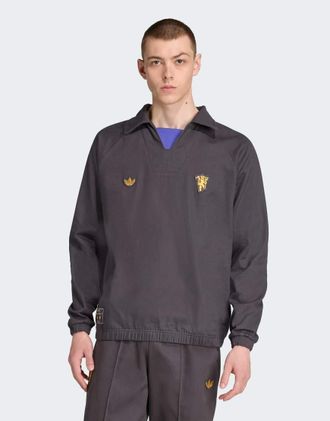 adidas Originals Manchester United Terrace Icons - Sportoberteil in Utility-Schwarz