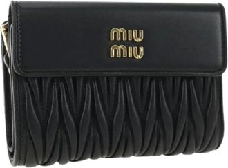 Miu Miu Portefeuille en cuir pr&eacute;-poss&eacute;d&eacute; - Femme - Pre-owned - Noir - Taille: ONE Size