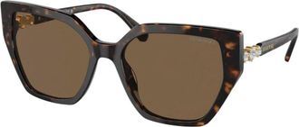 Swarovski Lunettes de soleil irr&eacute;guli&egrave;res - Femme - Accessoires - Brun - Taille: 56 MM