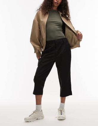 Rains 12530 Suva - Pantacourt slim imperm&eacute;able - Noir