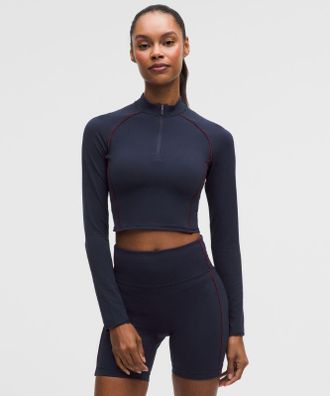 lululemon Wunder Train Crop-Langarmshirt mit kurzem Rei&szlig;verschluss f&uuml;r Frauen - Gr&ouml;&szlig;e 10 in True Navy/Burgundy Bay
