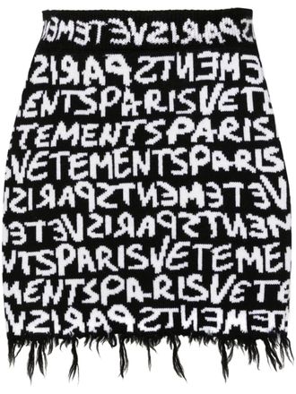 VETEMENTS minijupe à motif monogrammé - Noir